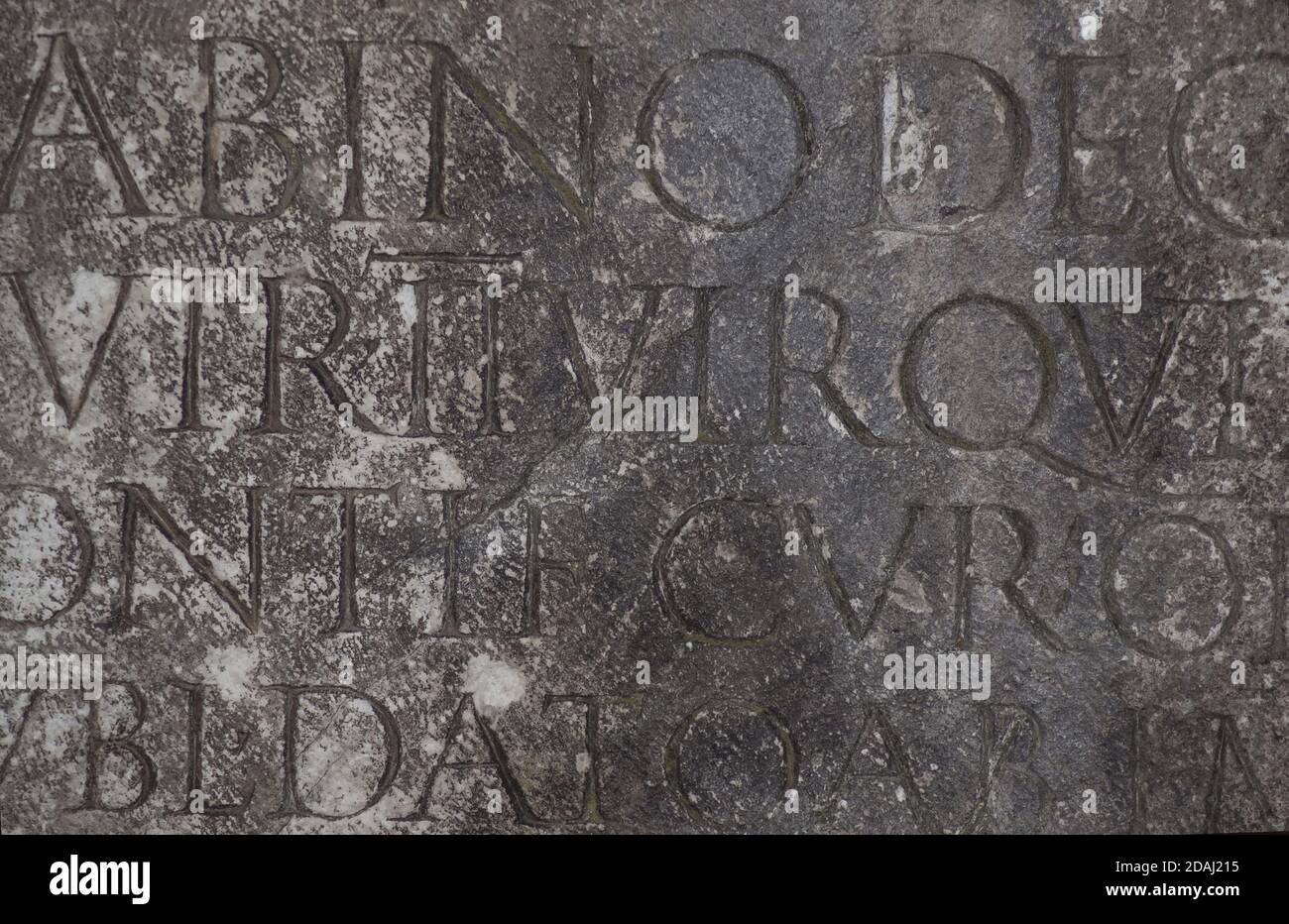 Closeup of an ancient Roman text carved in stone Stock Photo - Alamy