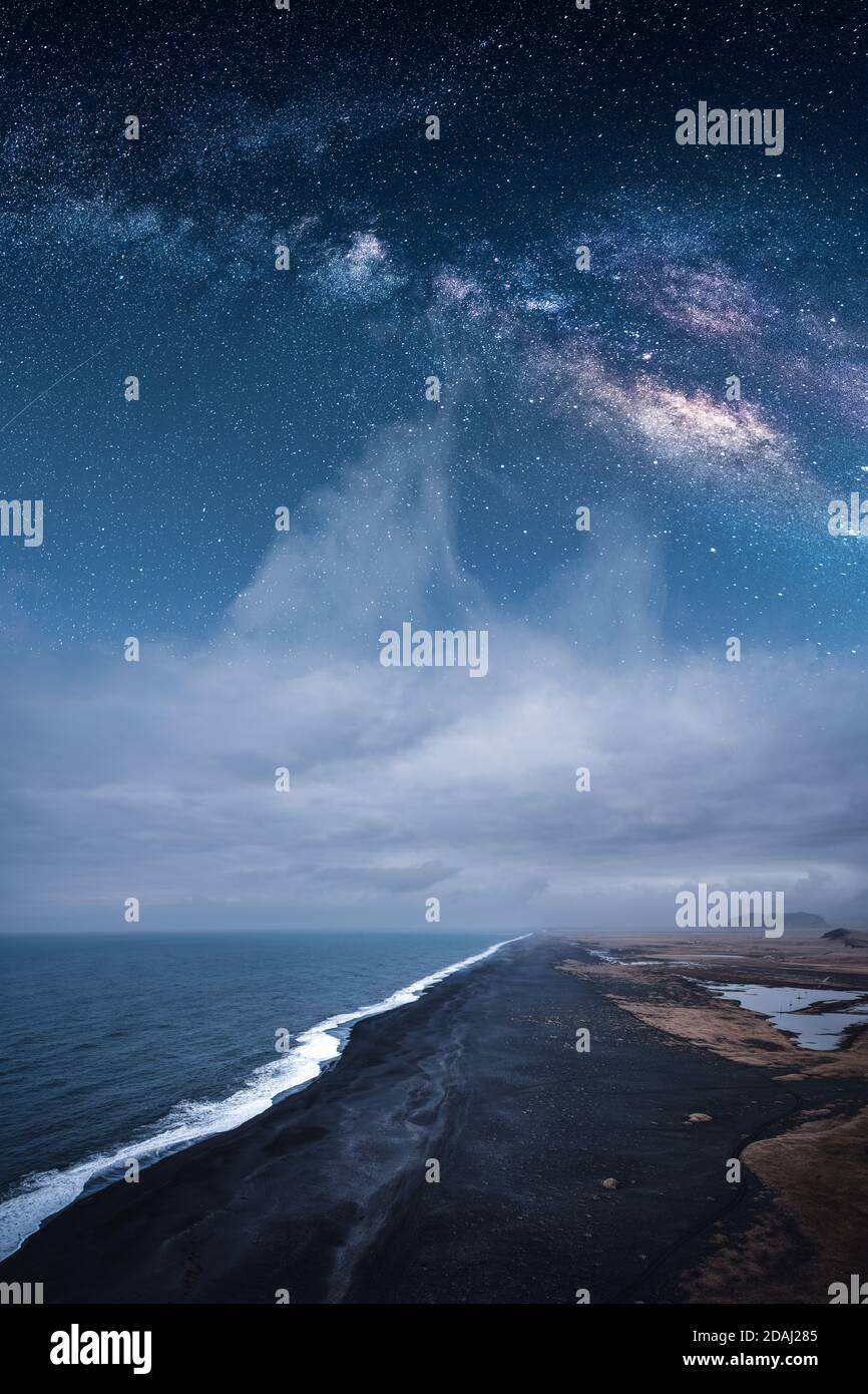 Ethereal view of a beach and milky way Stock Photo - Alamy