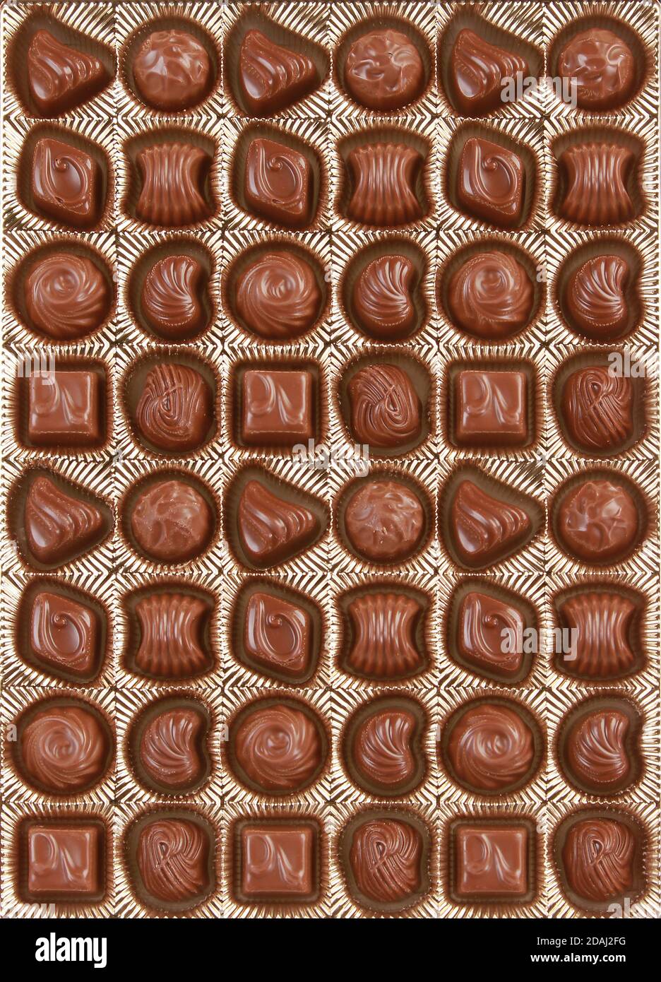 Vertical closeup shot of various types of chocolate candy Stock Photo ...