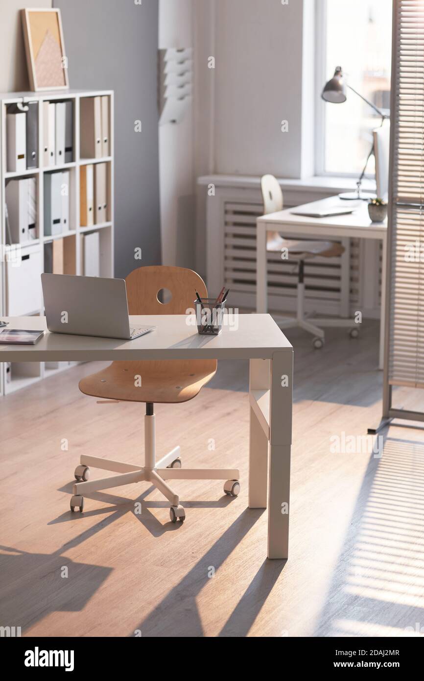 Image of empty room at office with desk with laptop on it Stock Photo ...