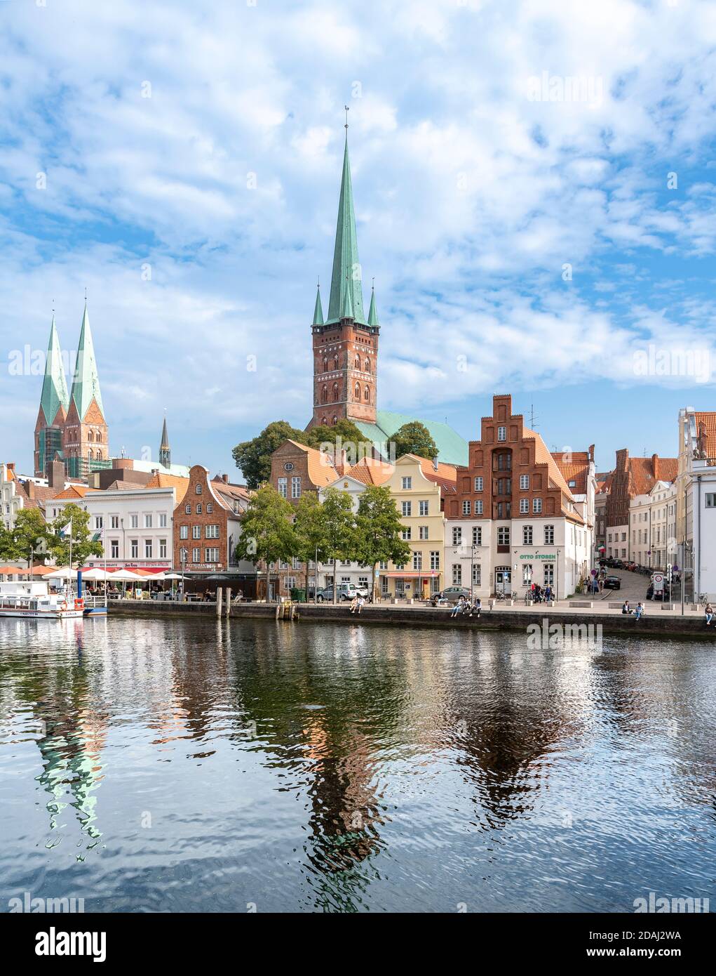 Lübeck Old Town by daylight. The church with twin spires is ...