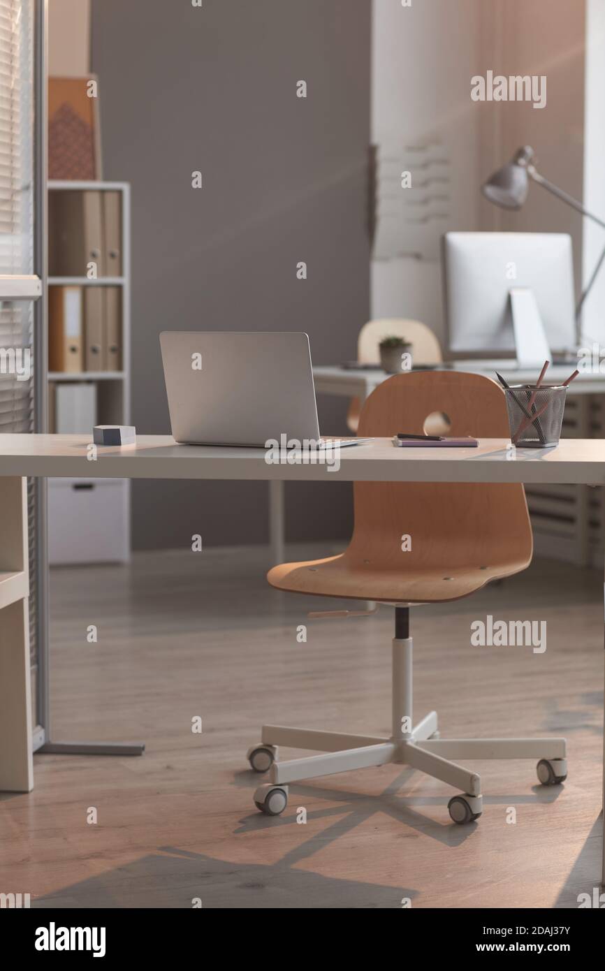 Image of empty workplace of businessman with laptop at modern empty ...