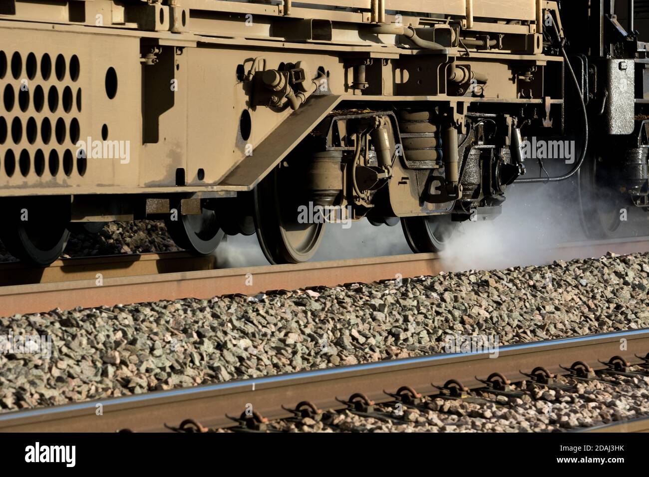 A Network Rail MPV (Multi-purpose vehicle) cleaning rails of fallen ...