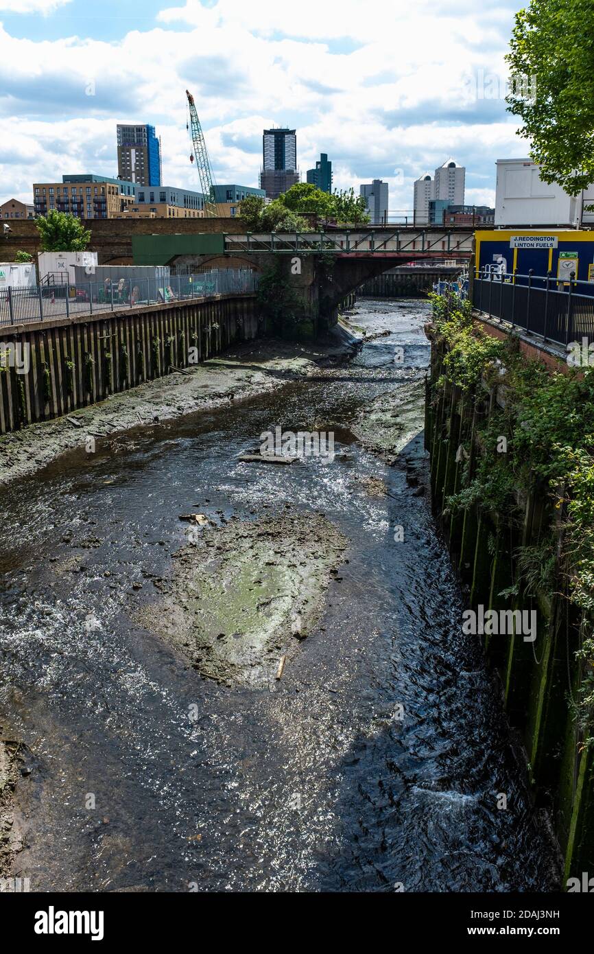 The River Wandle as it joins the River Thames at Wandsworth, London ...