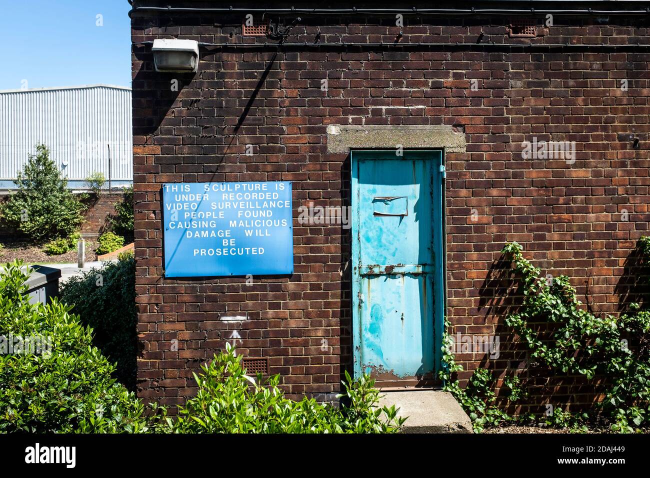 Notice warning against causing malicious damage to a sculpture which ...