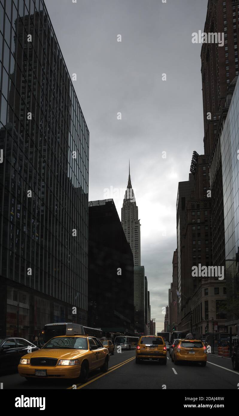 NEW YORK, USA - Apr 27, 2016: Image of Manhattan street on a cloudy day ...