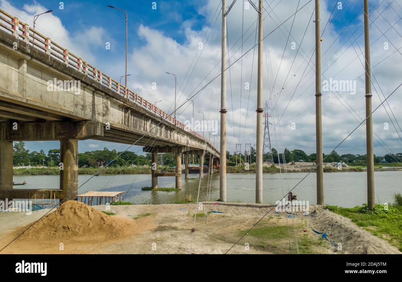 A beautiful architecture of Bridge on the river under lovely blue sky ...