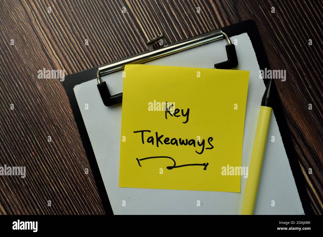 Key Takeaways on sticky Notes isolated on office desk Stock Photo - Alamy