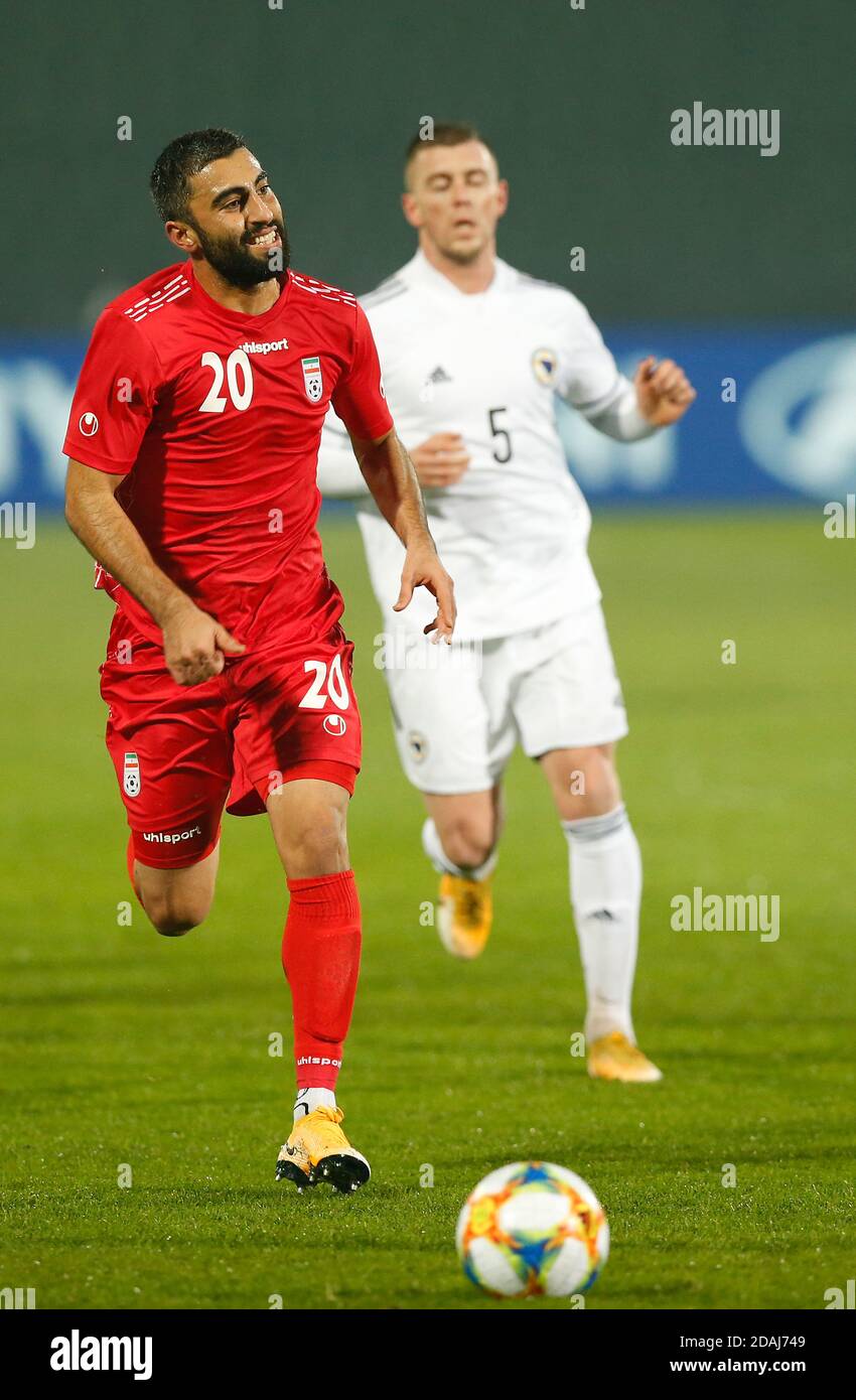 Iranian player Rezaei Kaveh, red dress control ball during a friendly ...