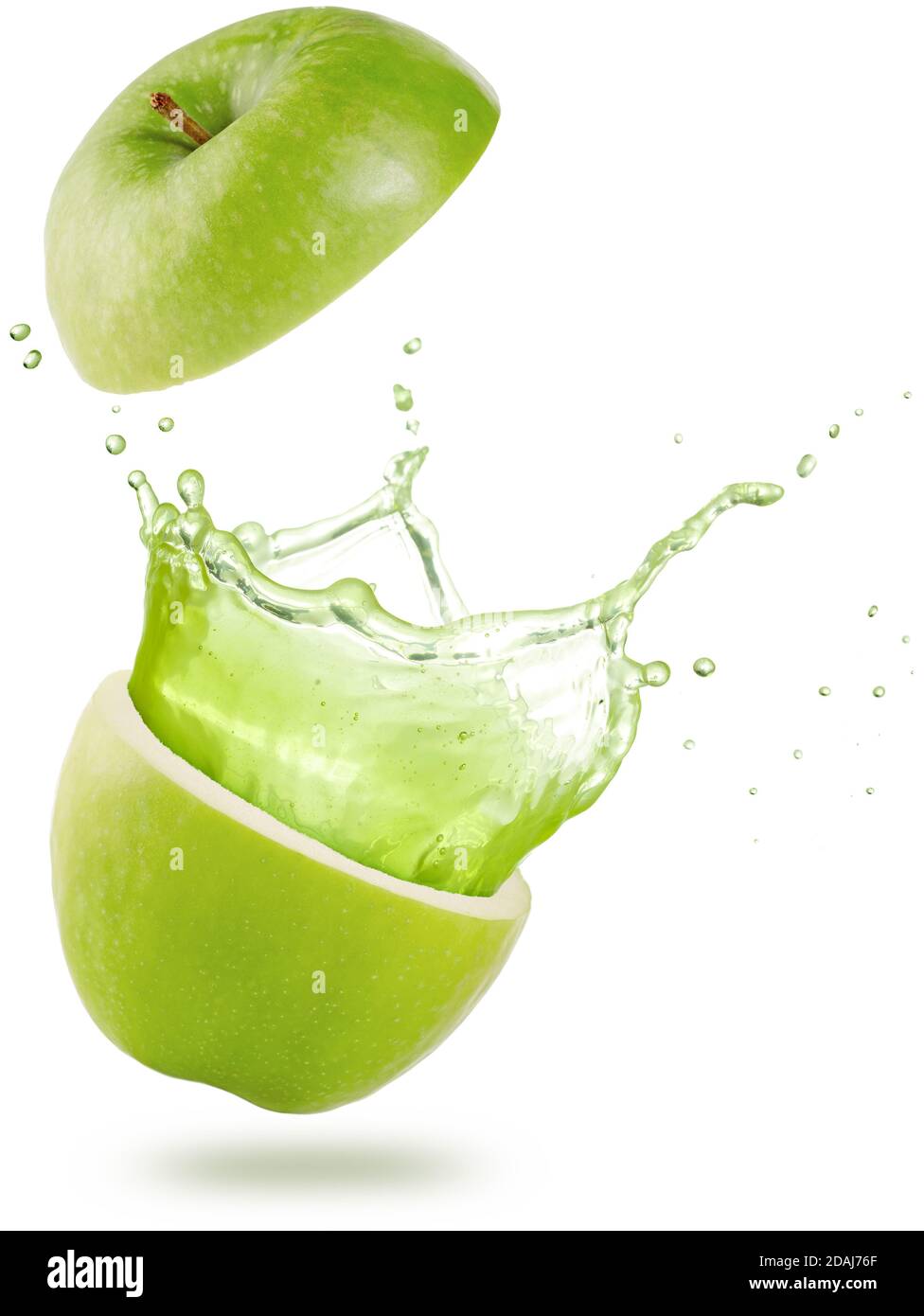 juice splashing out of a green apple isolated on white background Stock ...