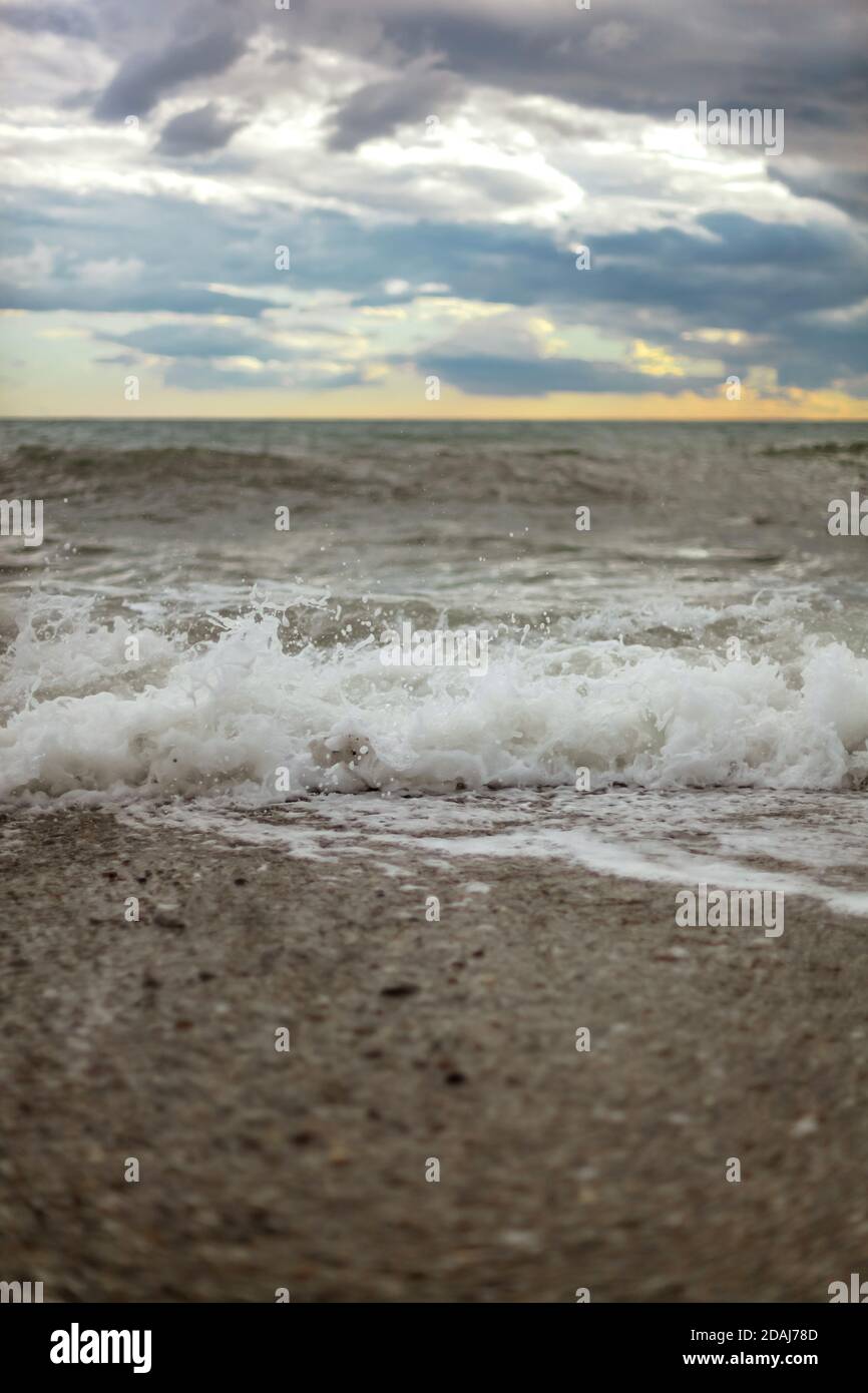 summer Sea or ocean cloudy sky, wave after storm with splash. Space for ...