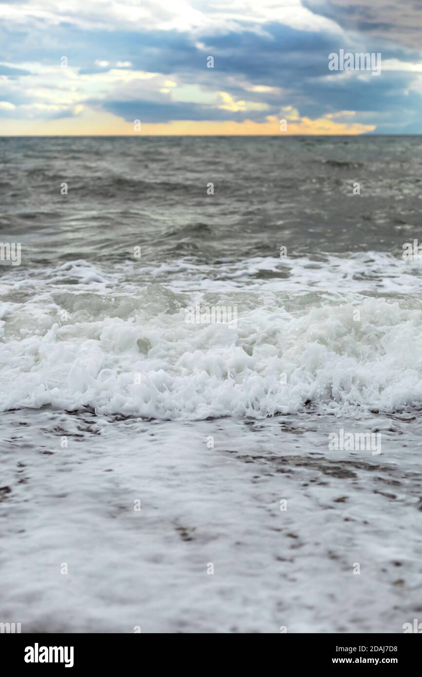 summer Sea or ocean cloudy sky, wave after storm with splash. Space for ...