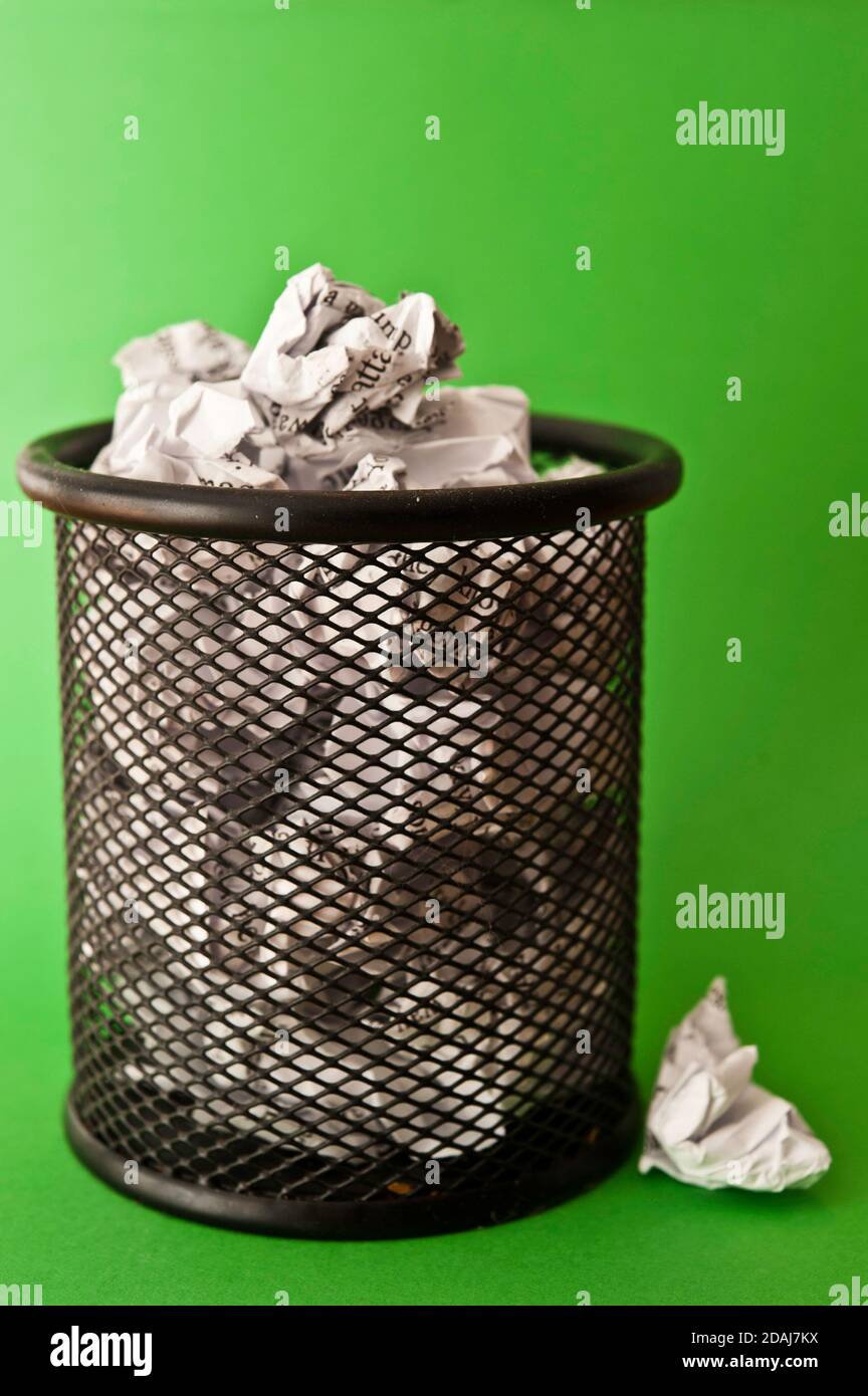 bin full with crumpled paper Stock Photo - Alamy