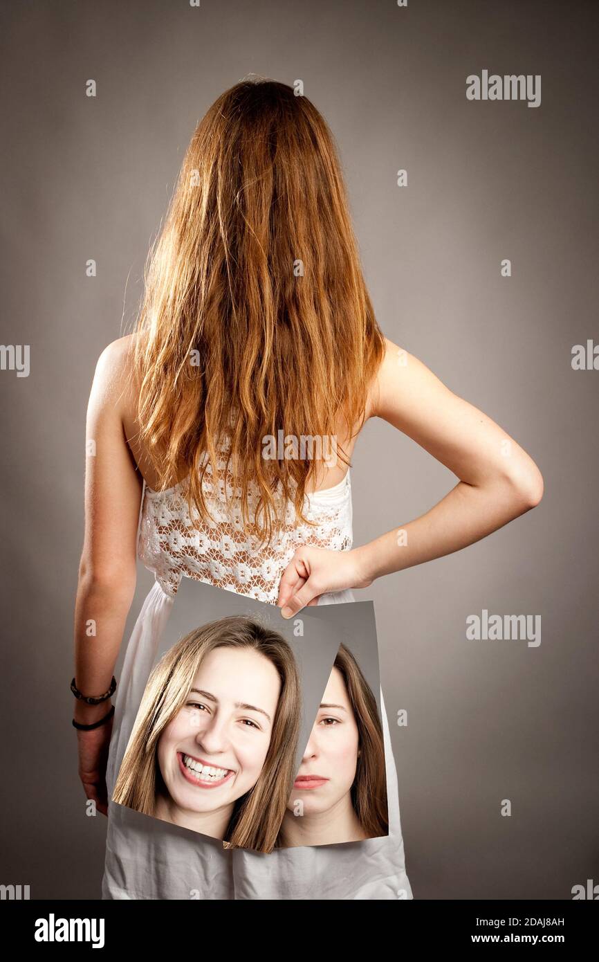 portrait of young girl with two faces Stock Photo - Alamy