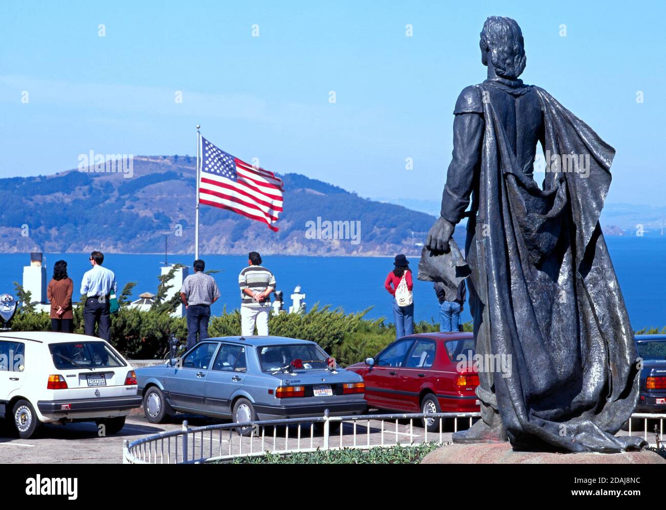 Statue of Columbus by Coit Tower overlooking the bay, San Francisco ...