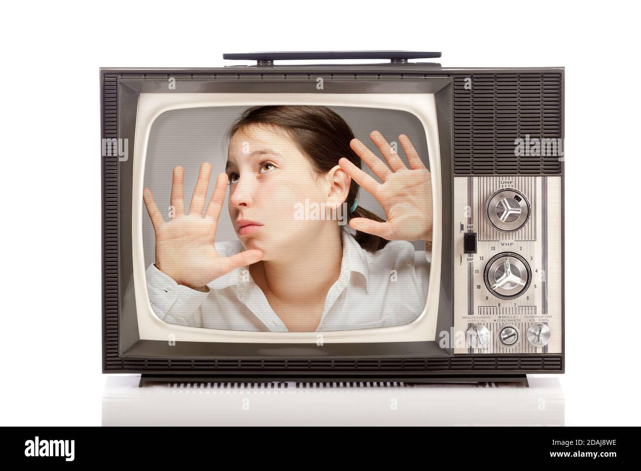 girl inside a retro portable television on white background Stock Photo ...