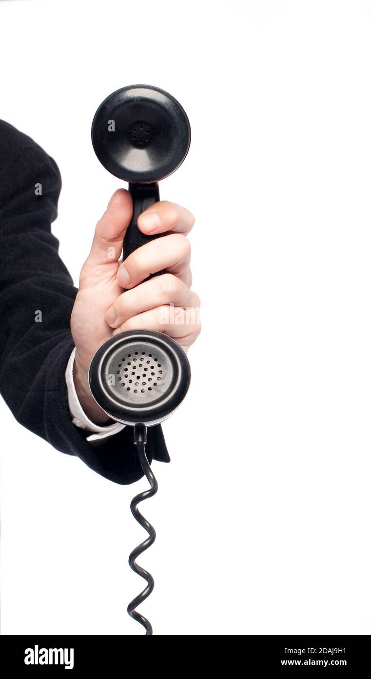 businessman hand holding retro telephone Stock Photo - Alamy