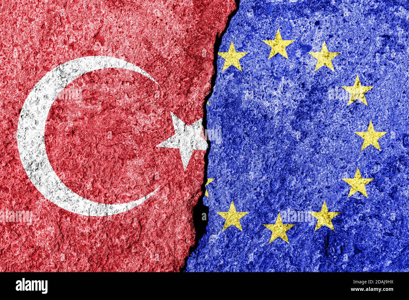 The crack between the European Union and Turkish flags on the concrete ...