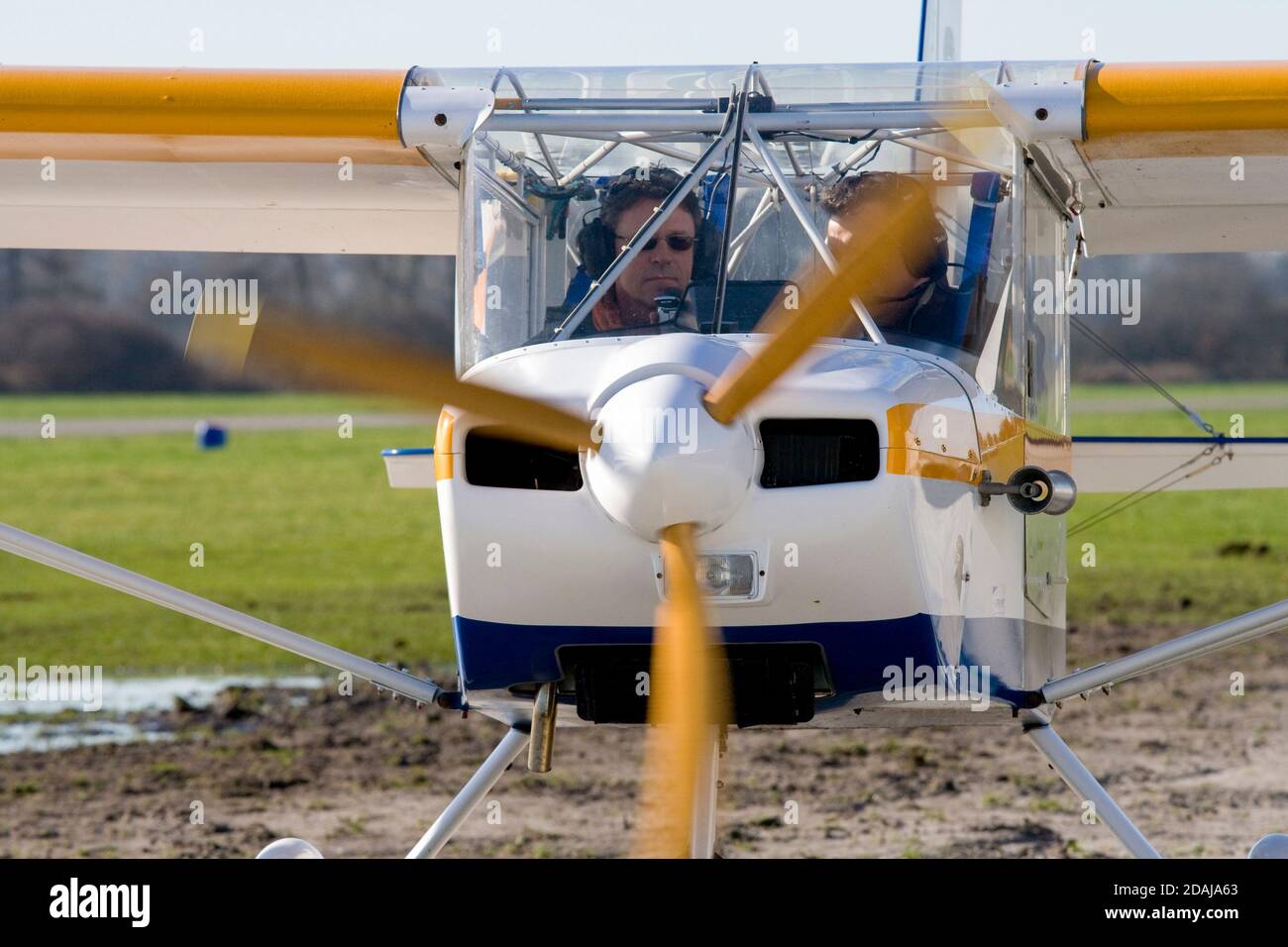 two men in cockpit of ultralight airplane Stock Photo - Alamy