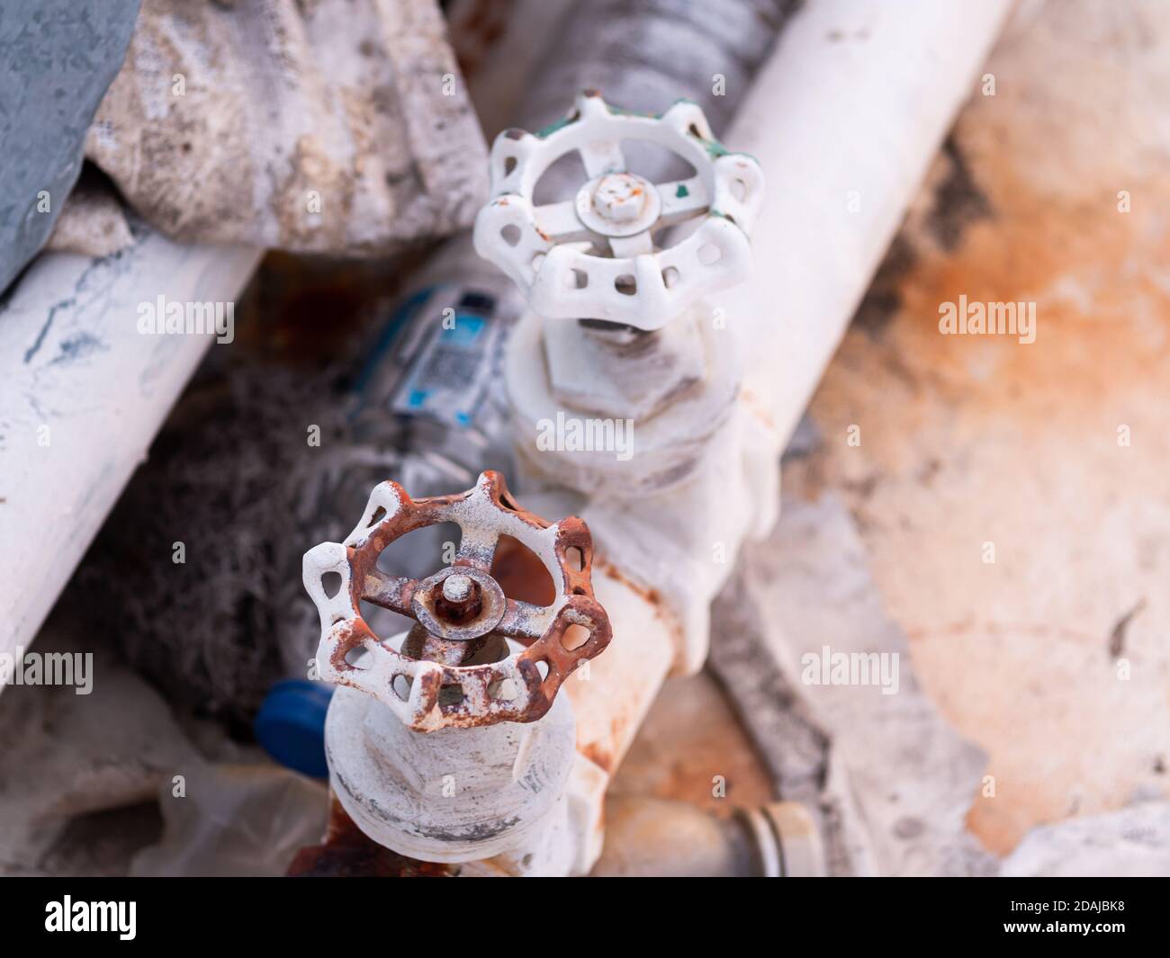 Damaged valves, pipes, and plumbing pipes, and lots of rusting, causing ...