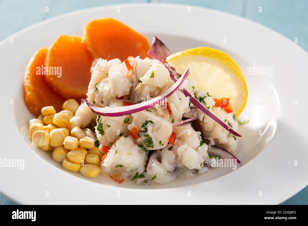 Traditional peruvian ceviche with fish, sweet potato, corn and ...