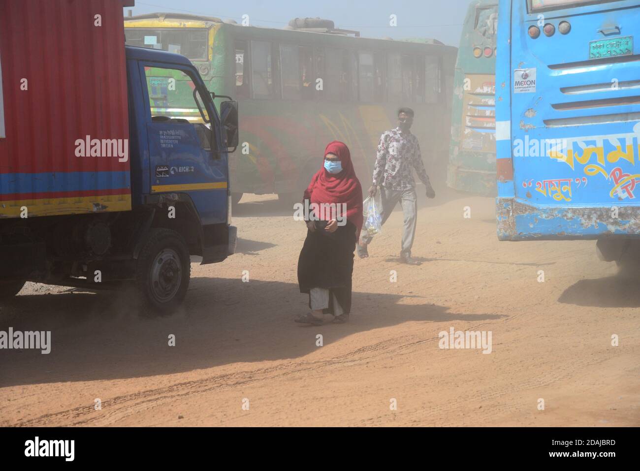 Man walking on dusty road hi-res stock photography and images - Alamy