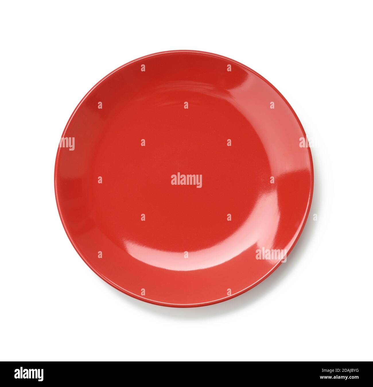 round red plate for main courses isolated on white background, top view ...