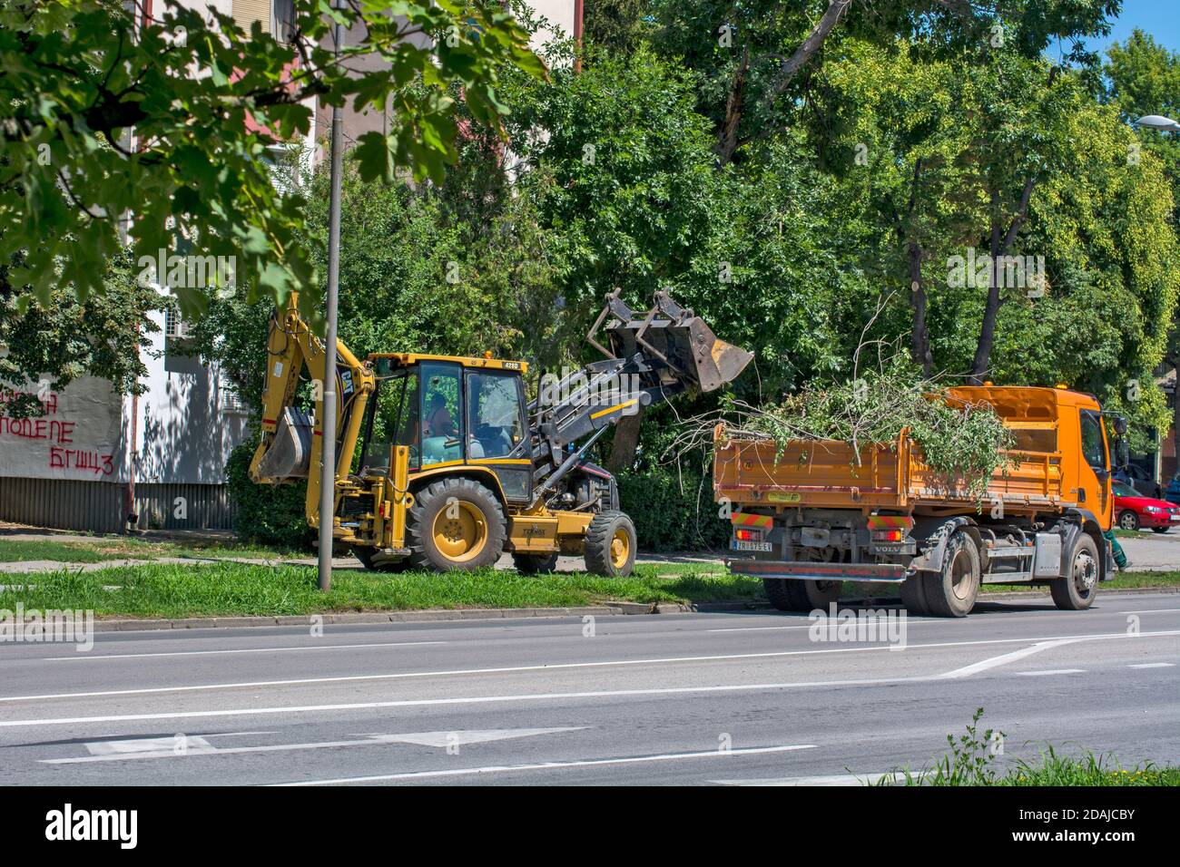Zrenjanin, July 29, 2020. Mechanized loading of communal rubble into a ...