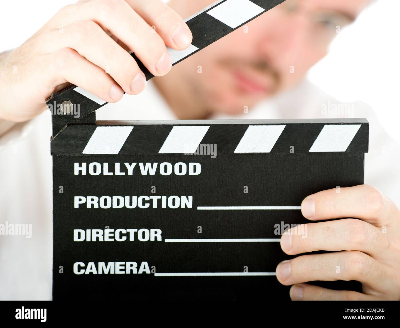 businessman with a film slate isolated on white background Stock Photo ...