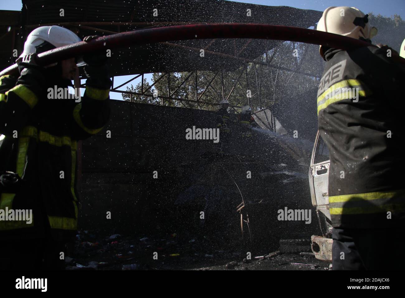 Kathmandu, NE, Nepal. 13th Nov, 2020. Nepali Army Firefighters put out ...