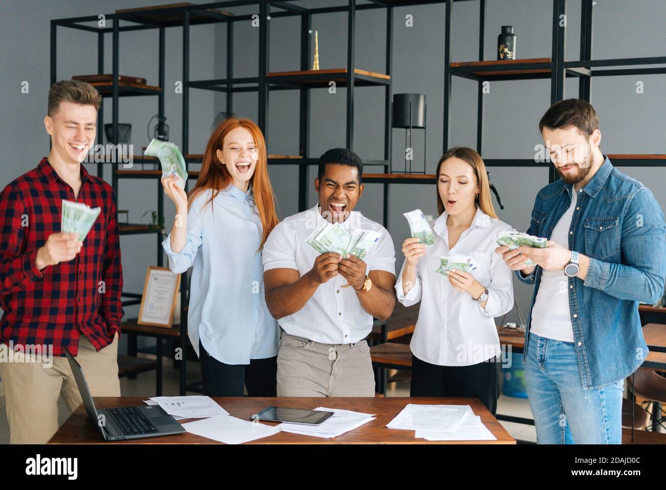 Successful teamwork and happiness business people holding money and ...