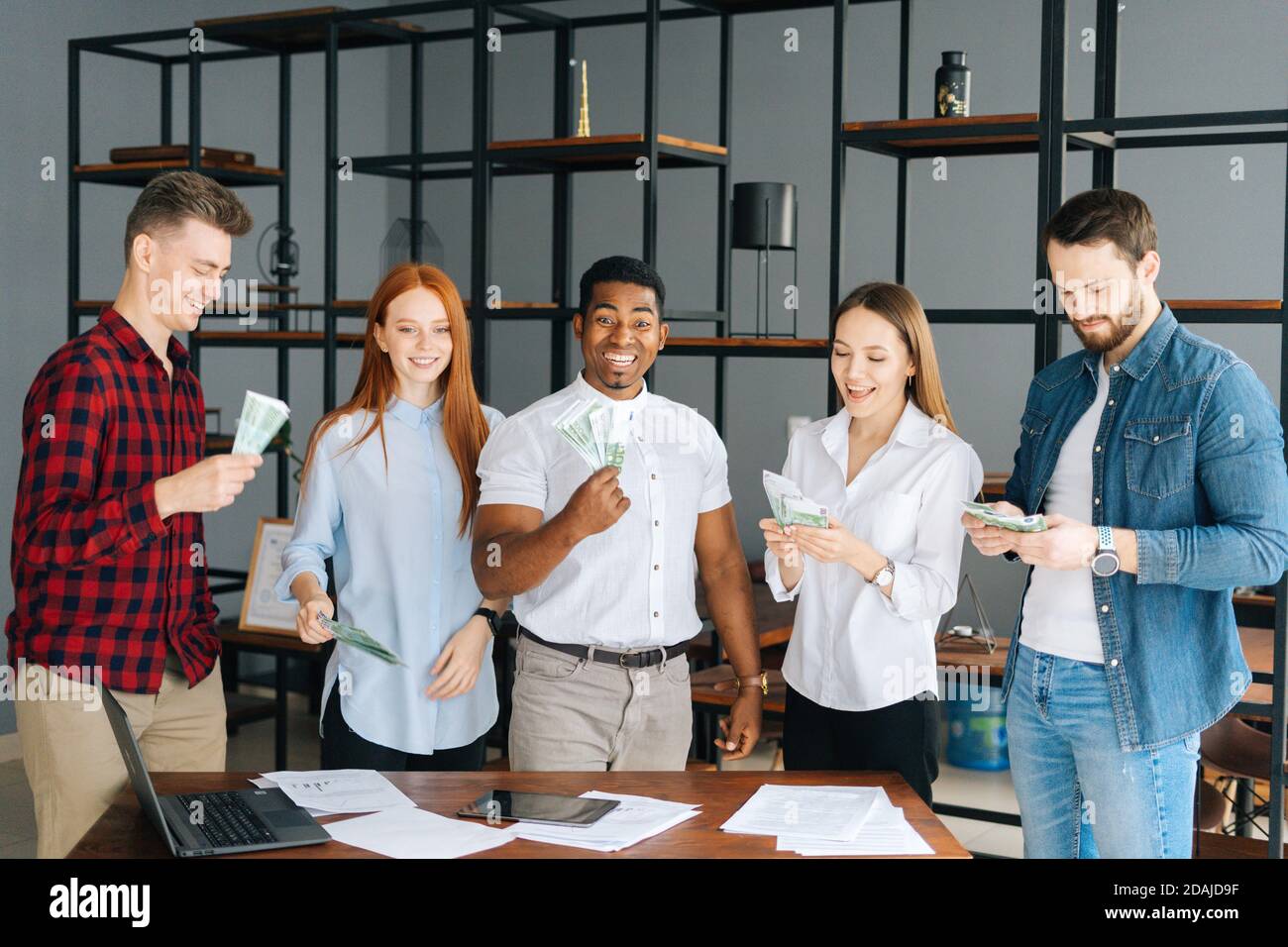 Money multiethnic hi-res stock photography and images - Alamy