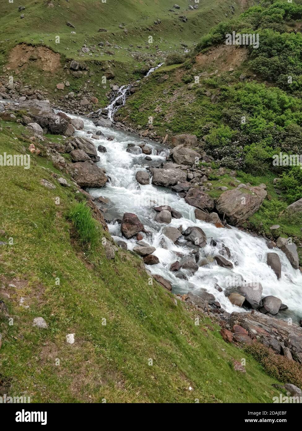 Beautiful river stream flowing through rocks in Indian Himalayan ...