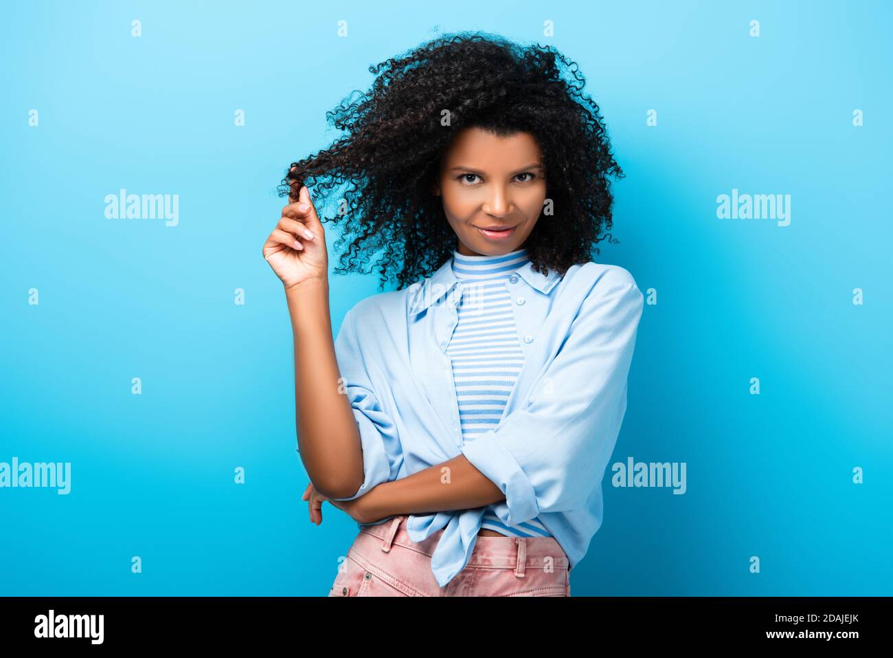 Twirling hair finger hi-res stock photography and images - Alamy