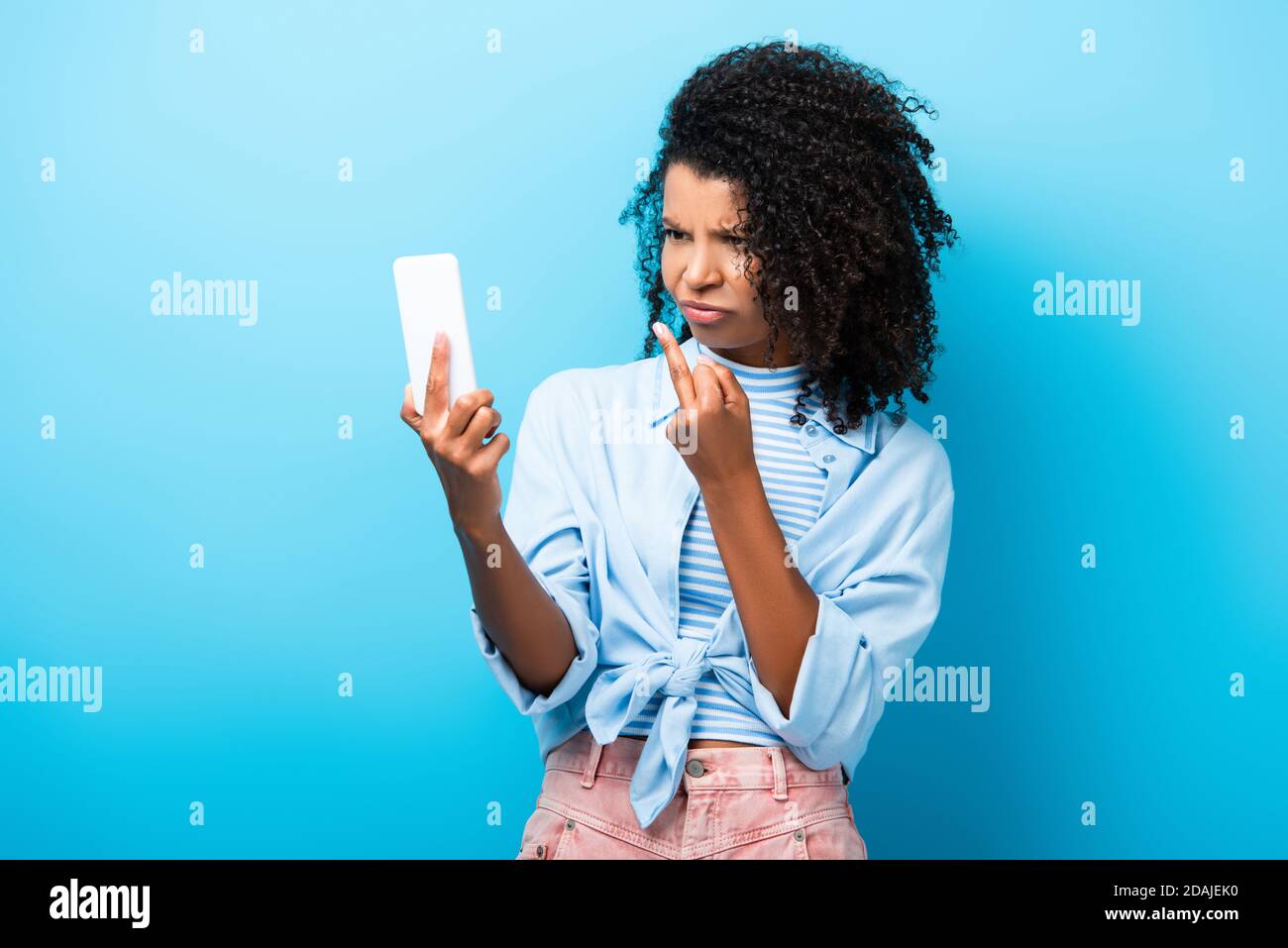 Woman showing middle finger hi-res stock photography and images - Alamy