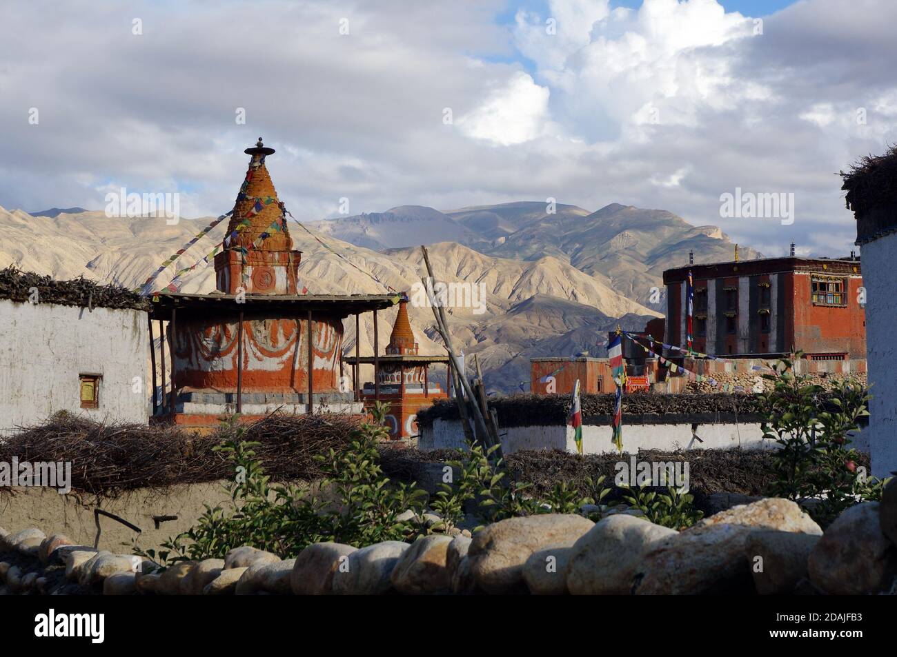 View of the colorful chorten and the Buddhist monastery in the Tsarang ...