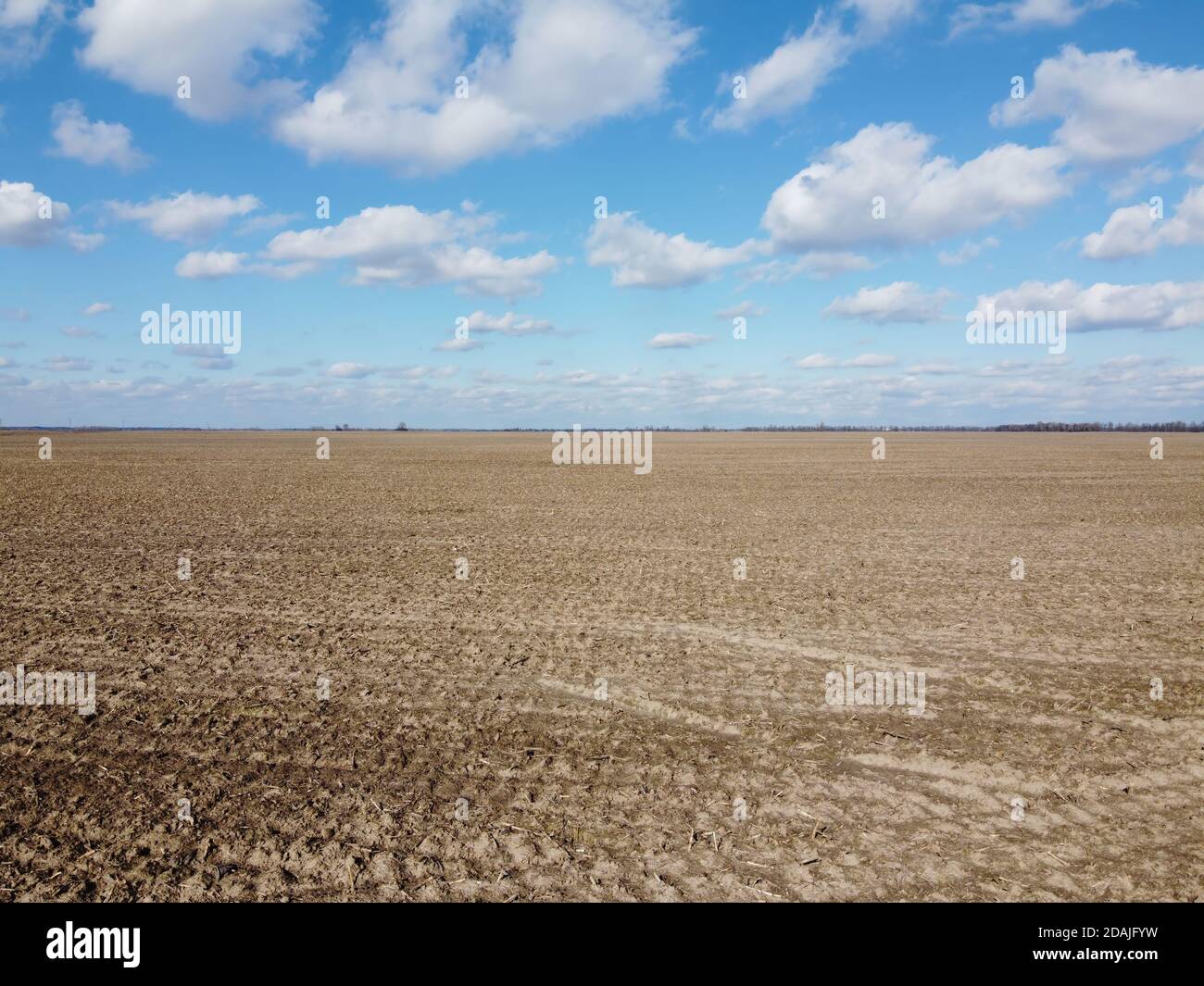 Beautiful blue sky over farm fields on a sunny day, aerial view ...