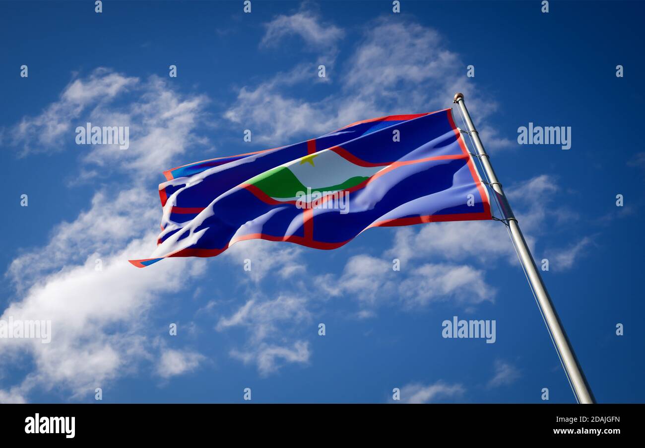 Beautiful national state flag of Sint Eustatius fluttering at sky ...
