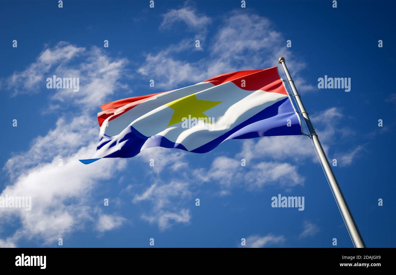 Beautiful national state flag of Saba fluttering at sky background. Low ...