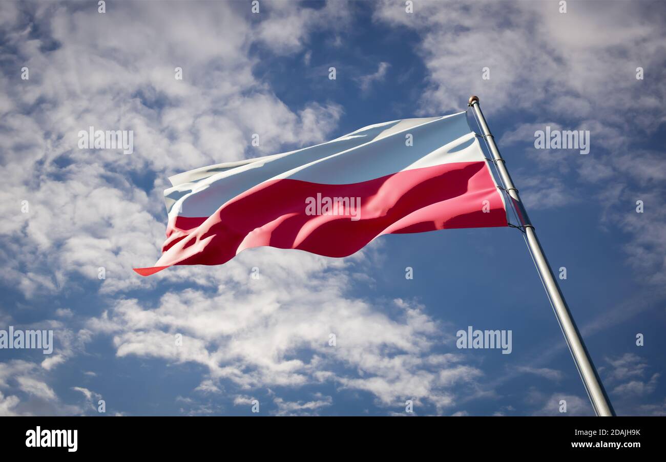 Beautiful national state flag of Poland fluttering at sky background ...