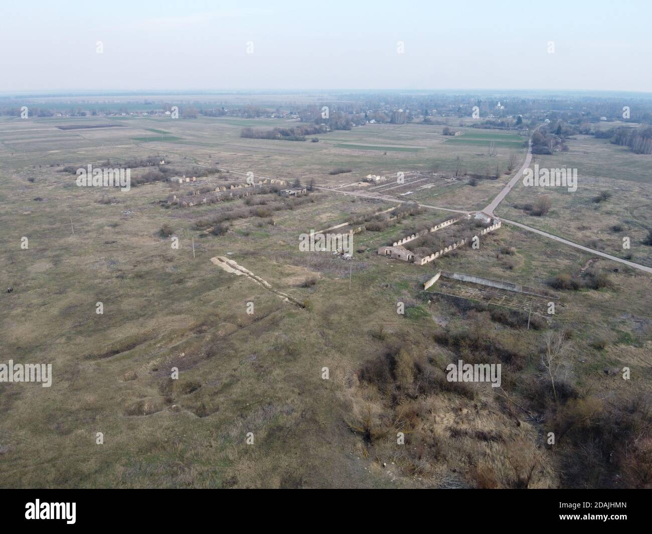 The ruins of a livestock farm, aerial view. Destroyed animal sheds ...