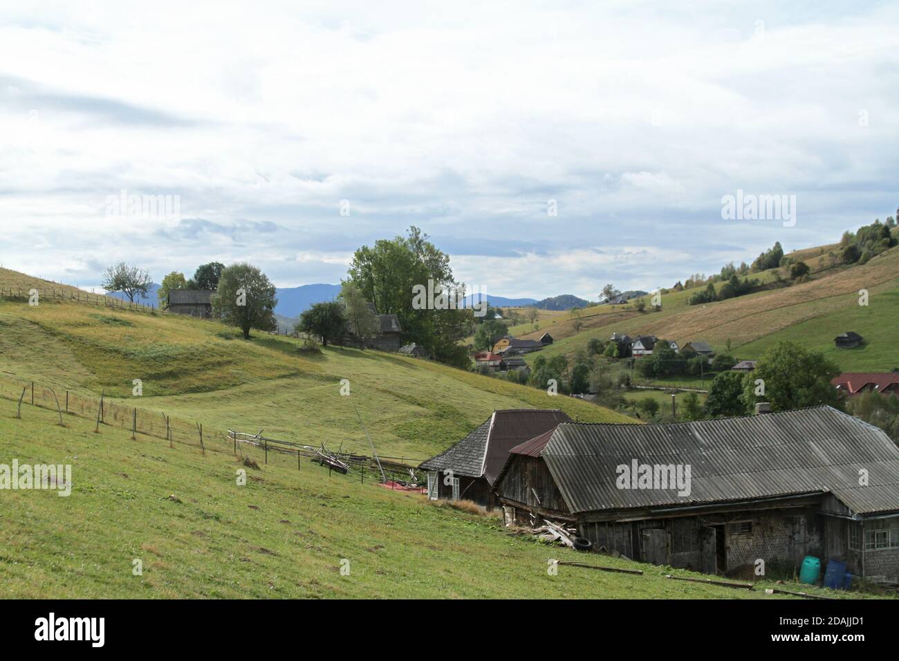 Houses in the village of Sirnea, Brasov County, Romania. Village at ...