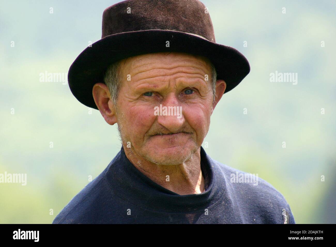 Portrait of elderly man in Romania's countryside Stock Photo - Alamy
