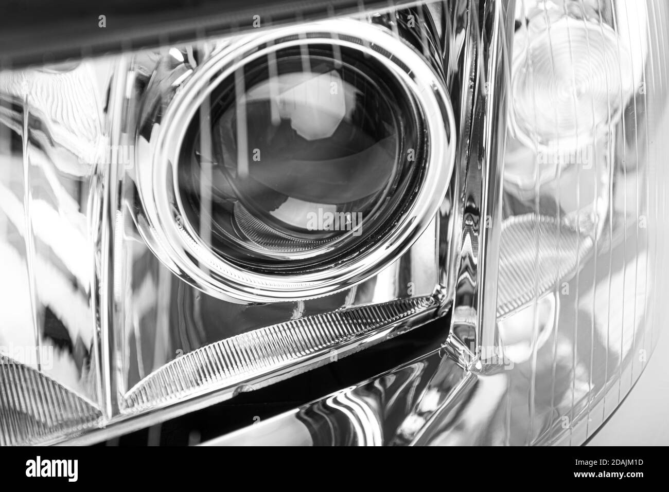 Car headlight at close range. New car headlight Stock Photo - Alamy