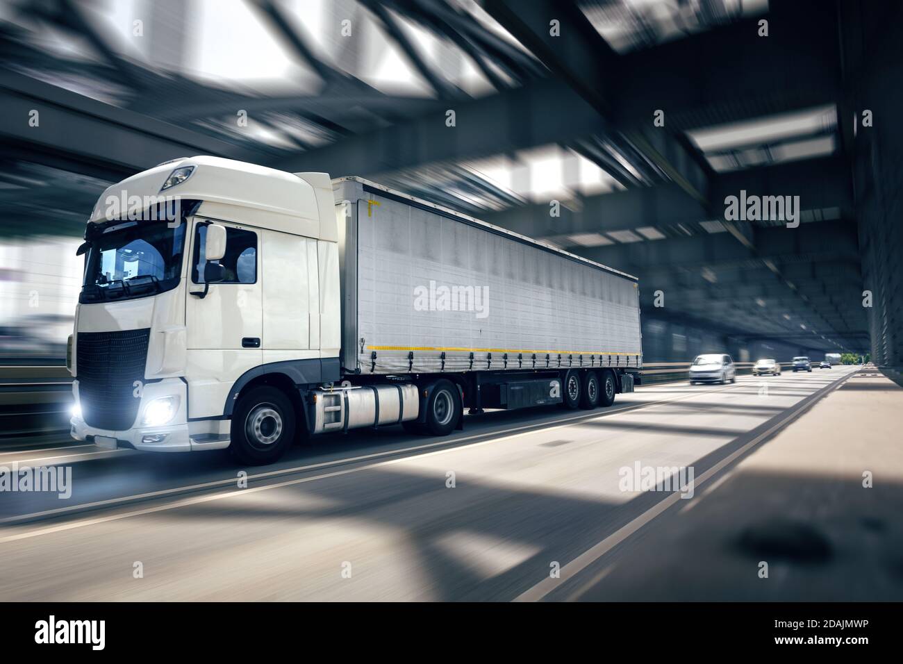 Cargo truck on road in hi-res stock photography and images - Alamy