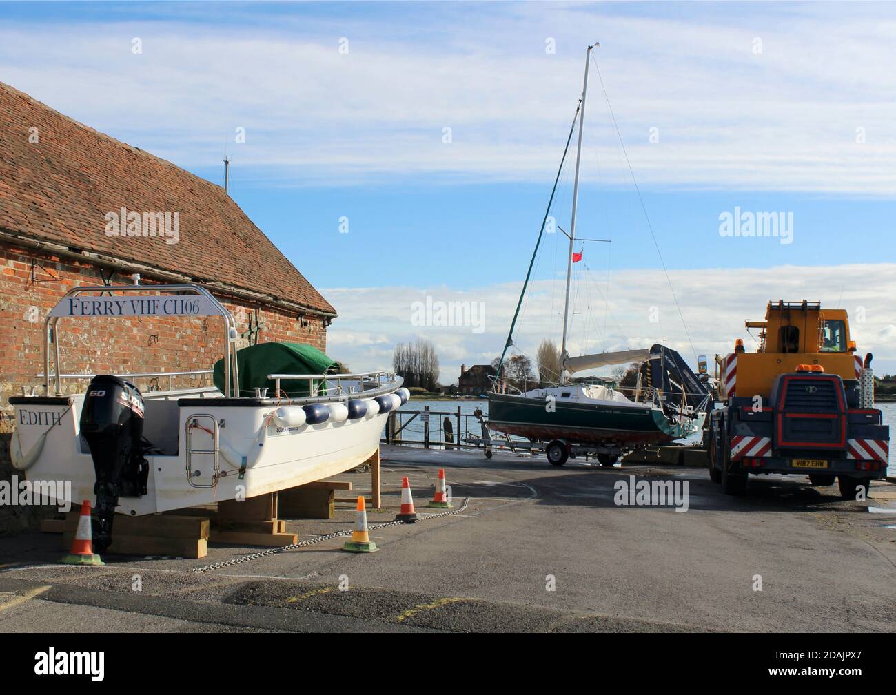 The ferry boat alongside the harbour master's office at Bosham Quay ...