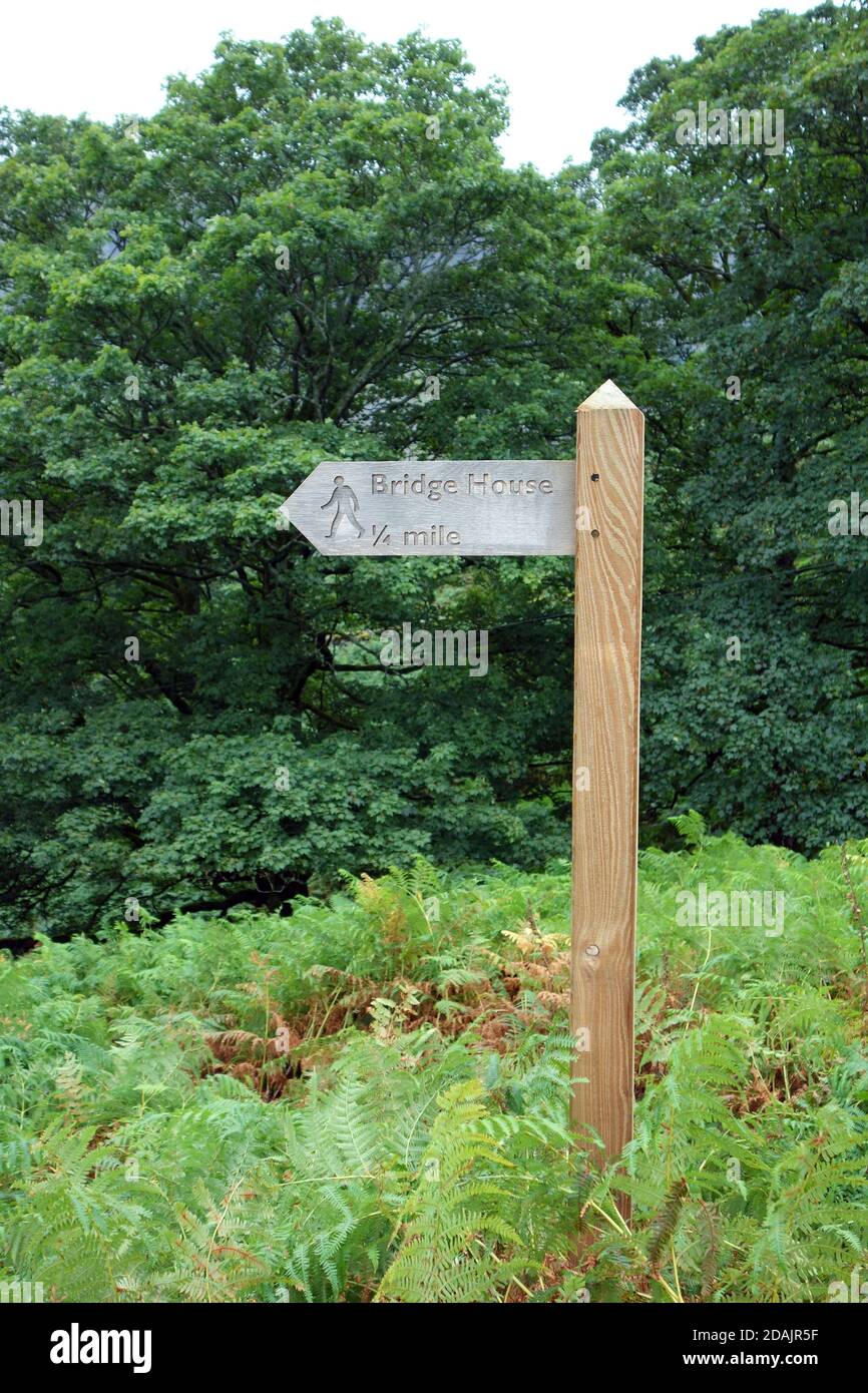 Wooden Signpost for Public Footpath to Bridge House in St John's in the ...