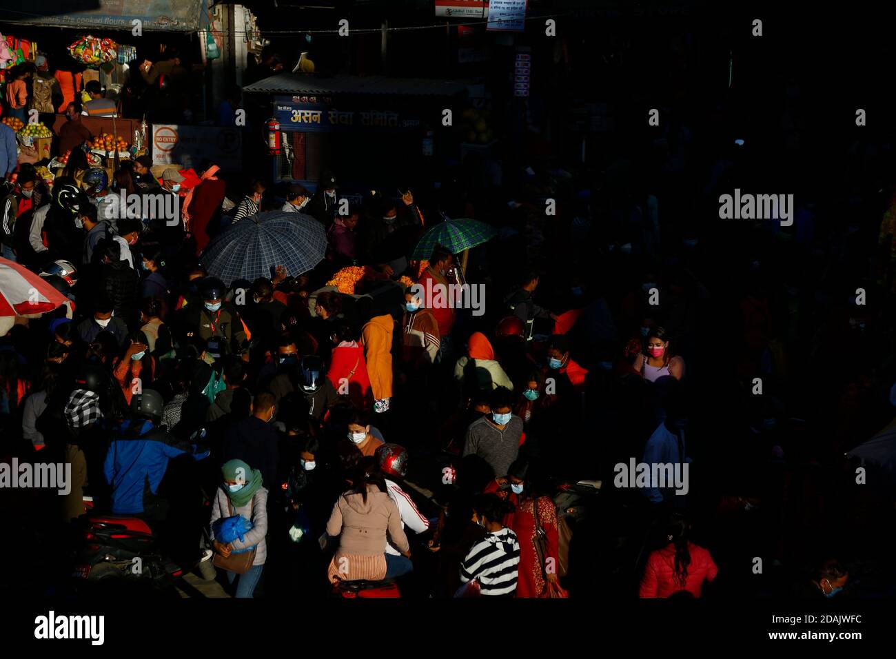 Kathmandu, Nepal. 13th Nov, 2020. Festive shoppers throng the Ason ...