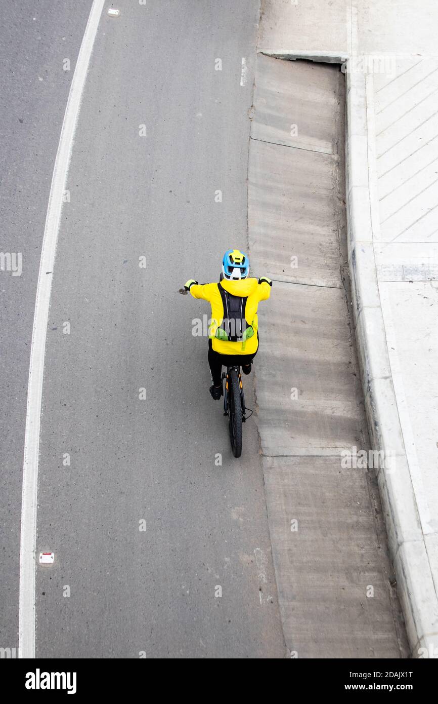 Overhead shot of an amateur male cyclist on the road between Bogota and ...