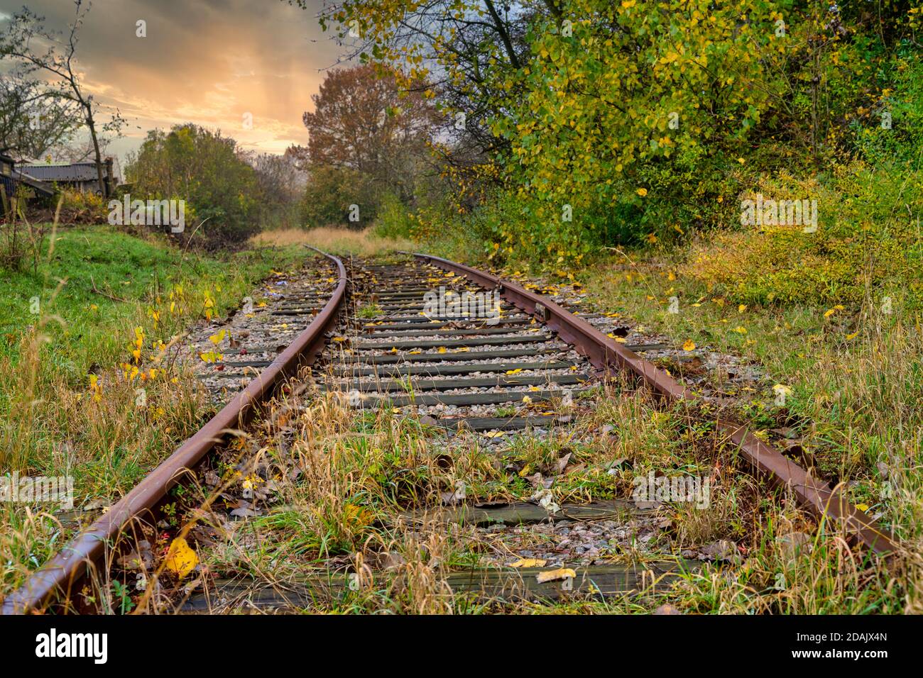 Railroad tracks with a dramatic sunset in the background. Picture from ...